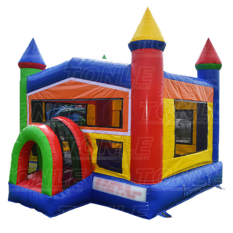 Classic red, yellow and blue castle-style inflatable bounce house for sale
